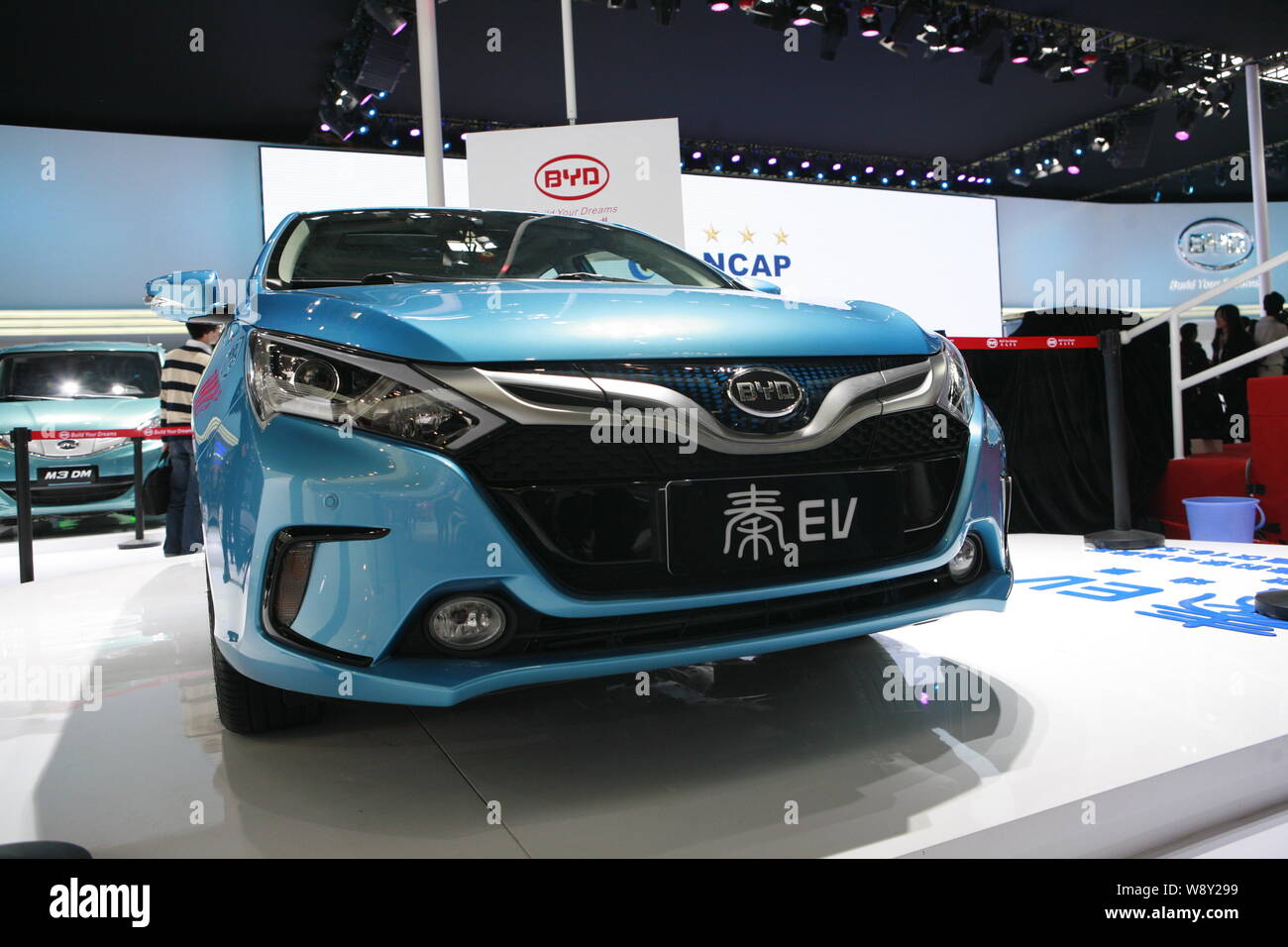 --FILE--A plug-in hybrid Qin of BYD is seen on display during the 13th ...