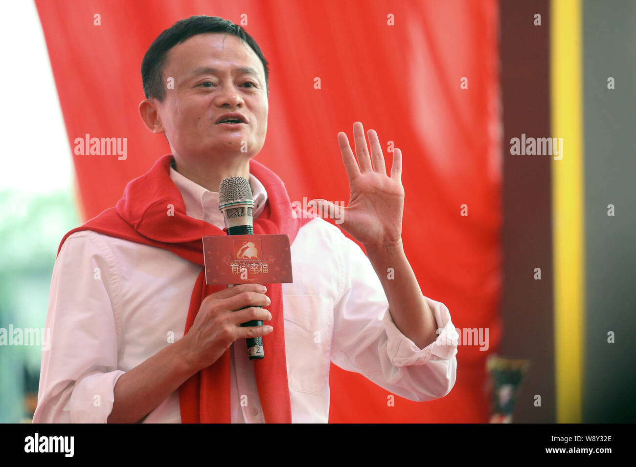 Jack Ma Yun, Chairman of Alibaba Group, speaks during a group wedding ...