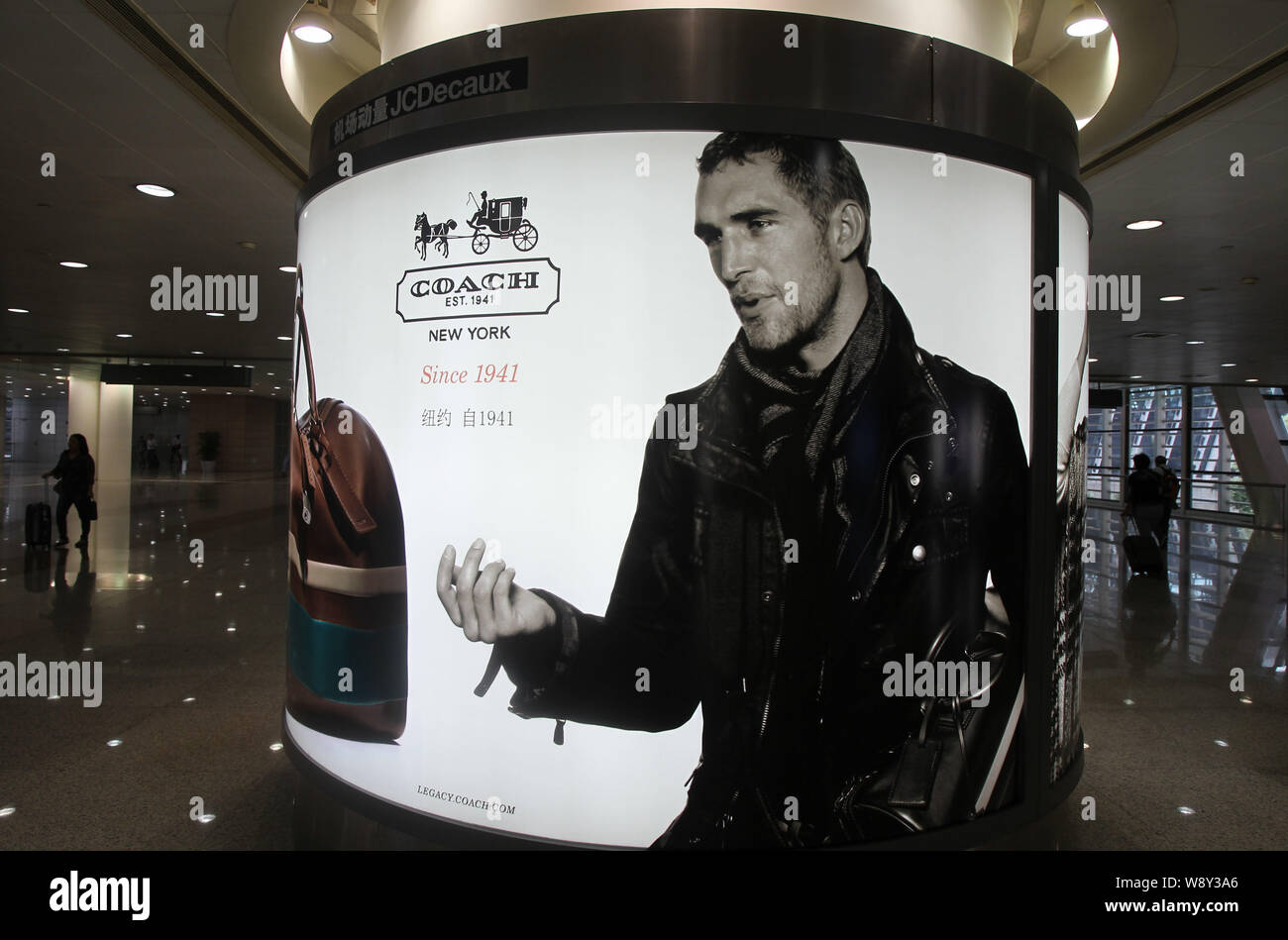 --FILE--An advertisement for Coach is pictured at the Shanghai Pudong ...