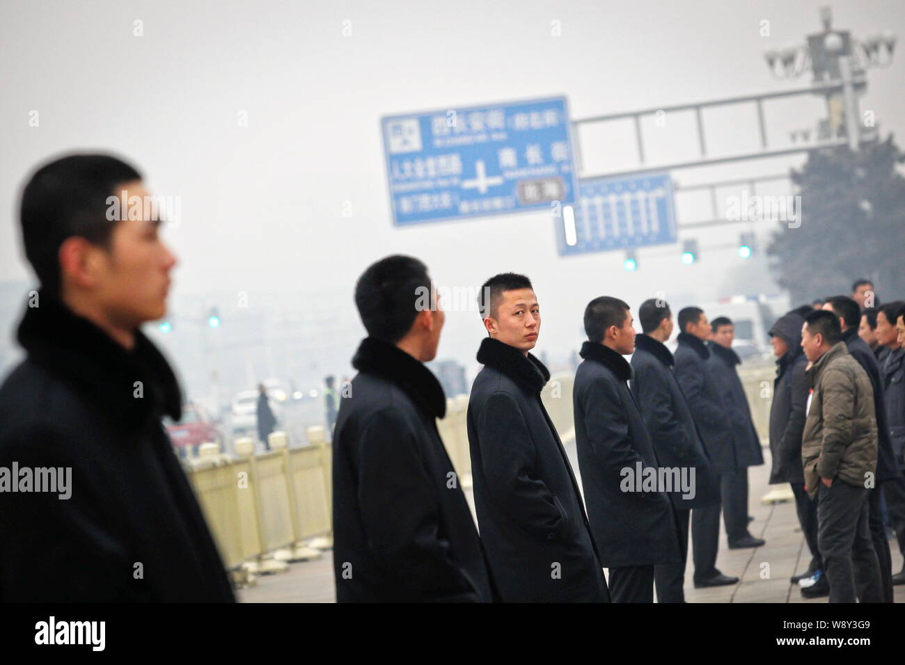 Chinese security guards stand in line at the Tiananmen Square in ...