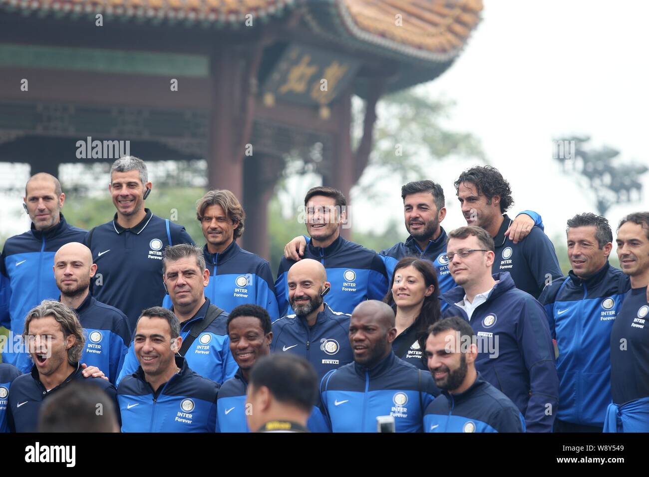 Argentine football star Javier Zanetti, back center, poses for photos ...