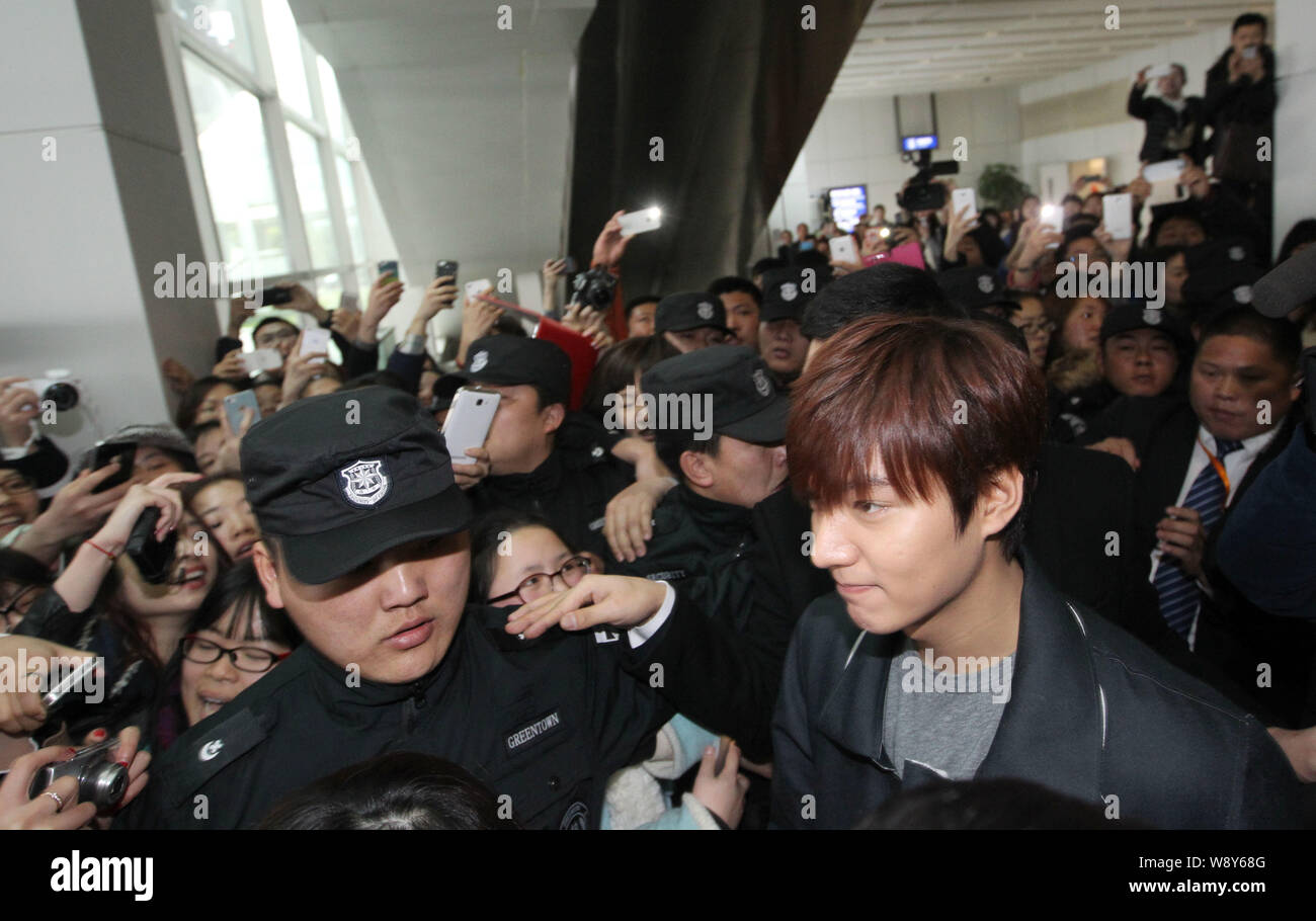 South Korean actor Lee Min-ho, front right, is surrounded by crowds of ...