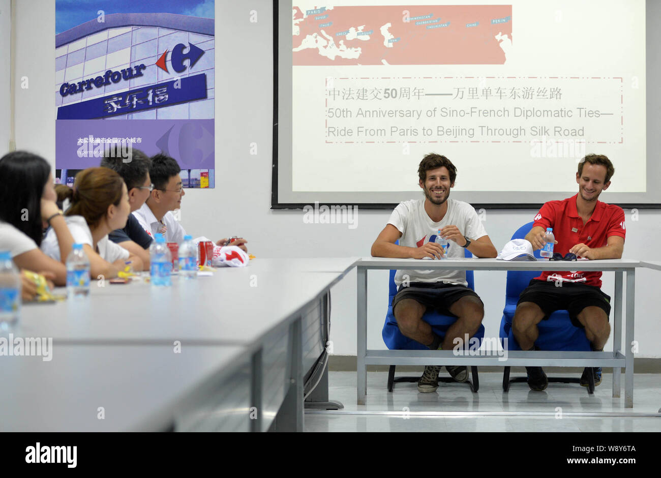 French cyclists Basile Pottier, right, and Simon Poniard, second right ...