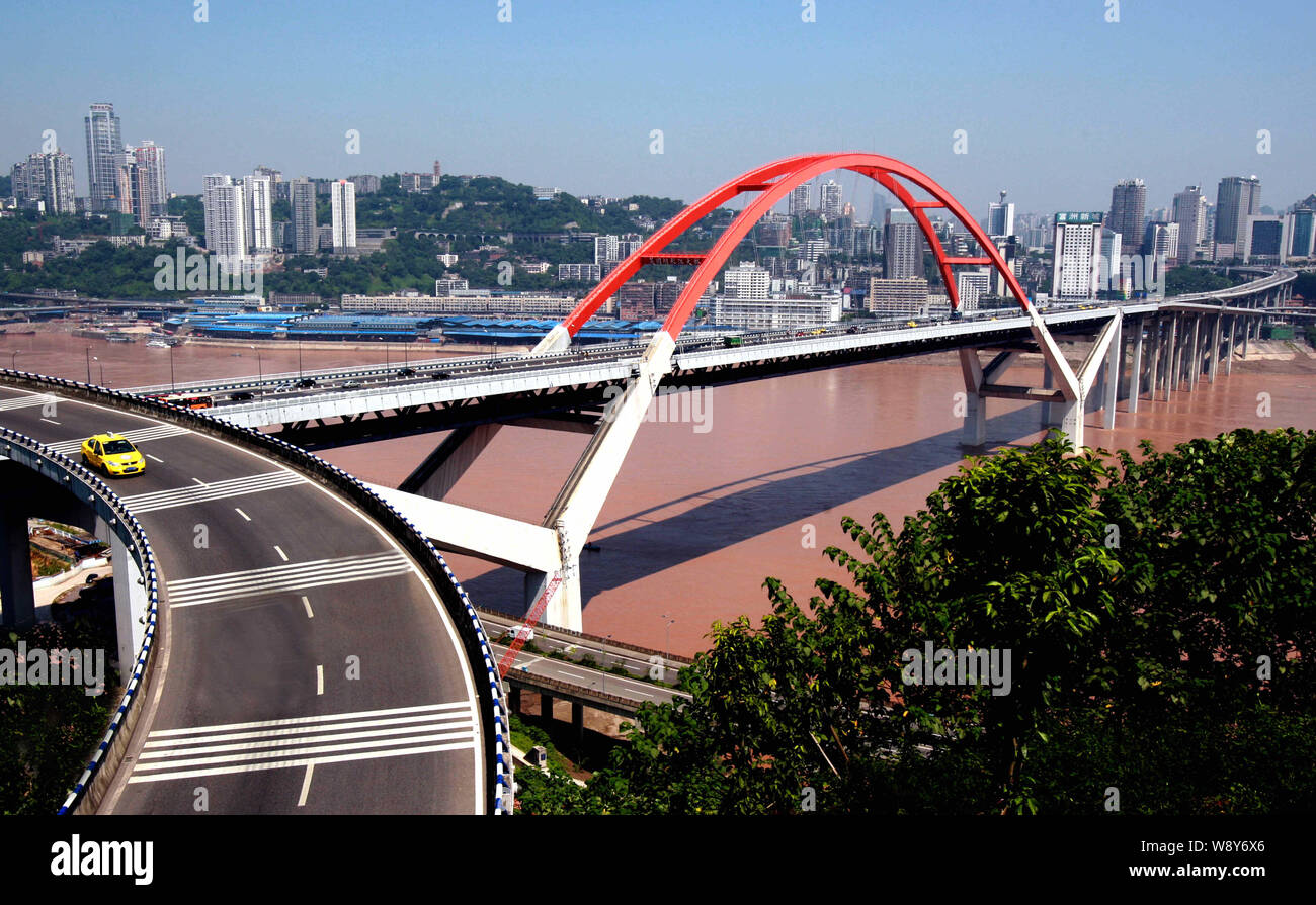 The Caiyuanba Bridge is seen over the Yangtze River in Chongqing, China ...