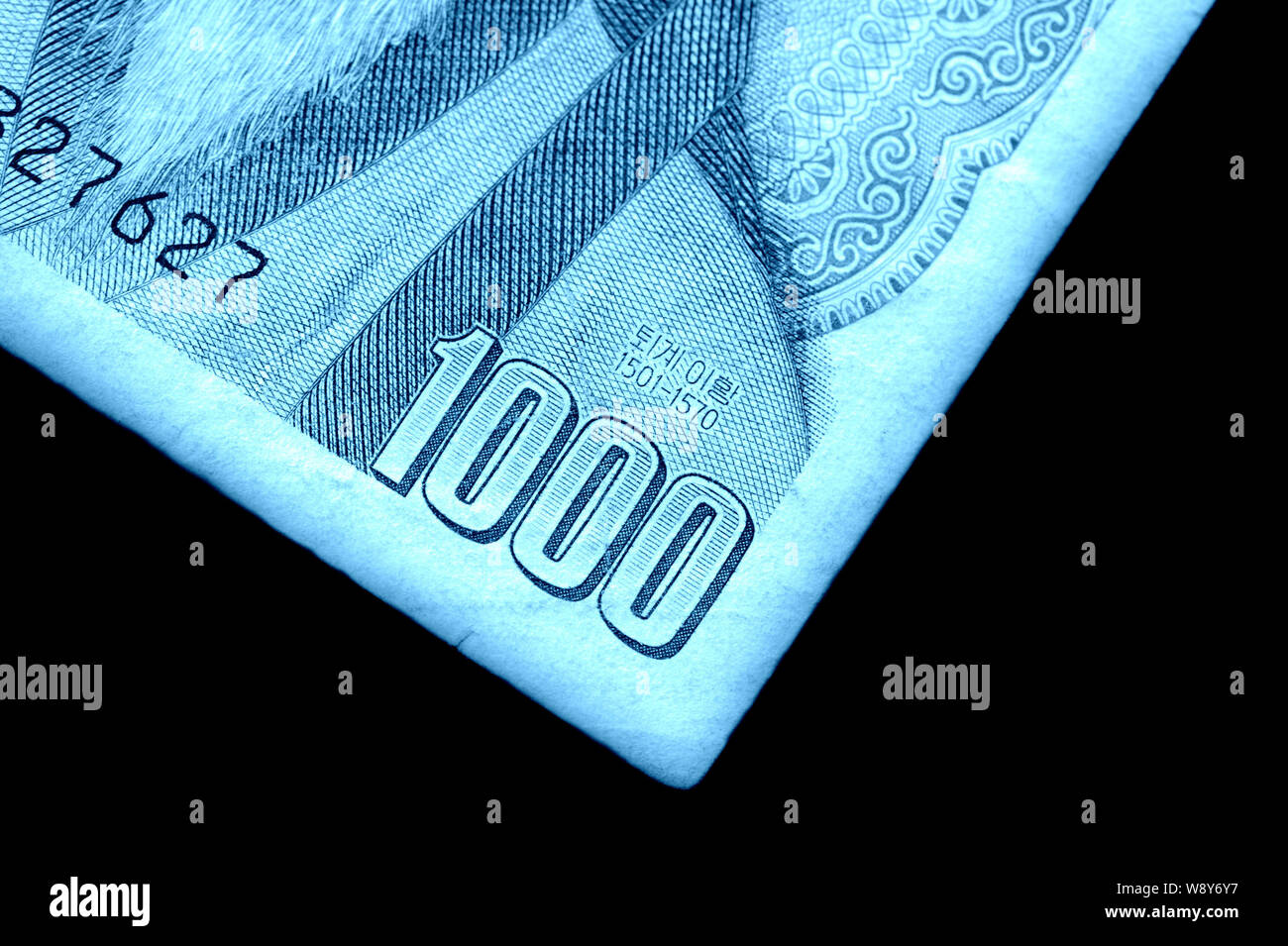 Outdated 1000 Korean Won note of 1983 issued close-up blue color toned ...