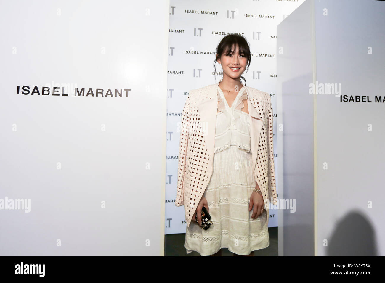 Chinese model and actress Chen Ran poses during the opening party for a ...