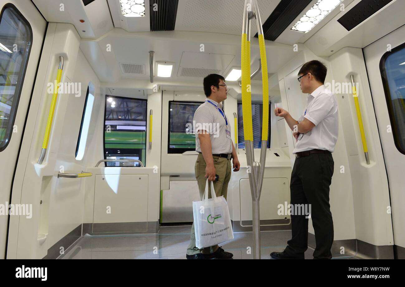 Visitors are seen in the headstock of Chinas first driverless subway ...