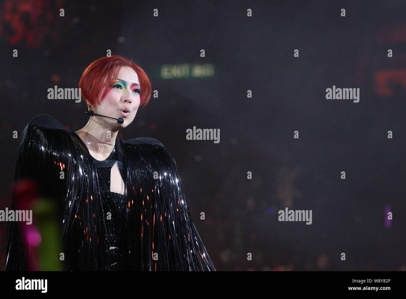 Hong Kong singer Sammi Cheng performs during her concert in Hong Kong ...