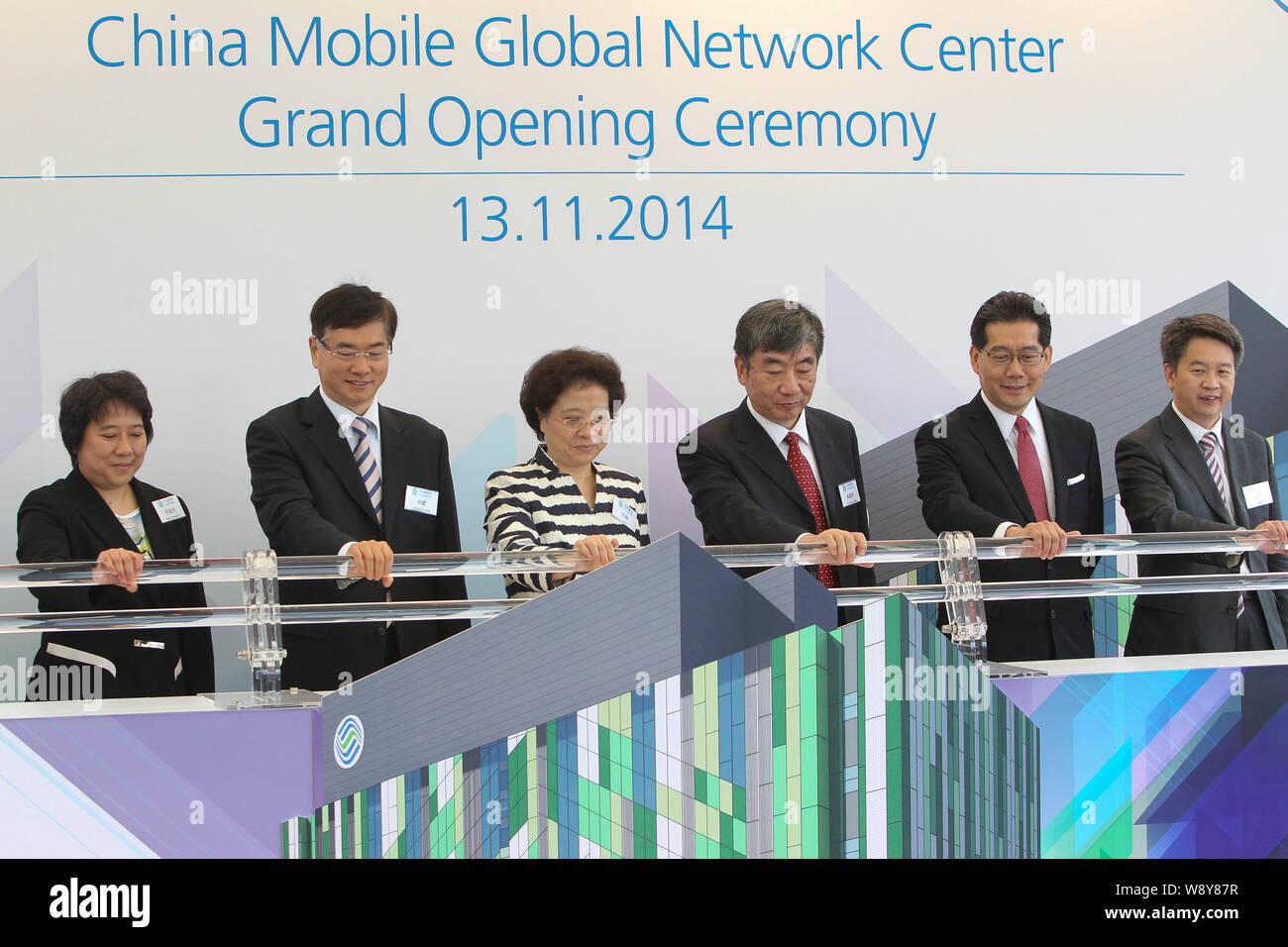 Xi Guohua, third right, Chairman of China Mobile, Li Yue, second left ...