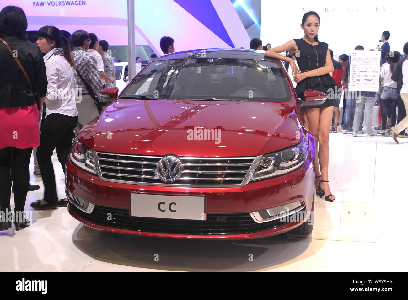 --FILE--A model poses with a CC of FAW-Volkswagen, a joint venture ...