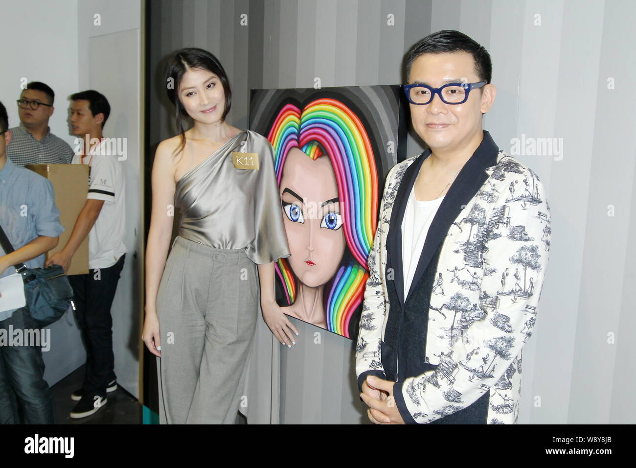 Hong Kong singer and actress Kelly Chen, left, poses with music ...