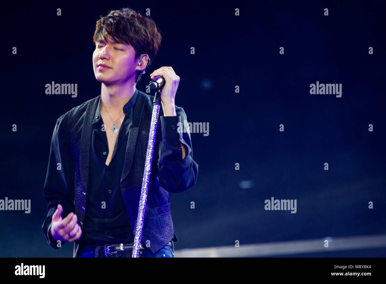 South Korean singer and actor Lee Min-ho performs at his fan meeting ...