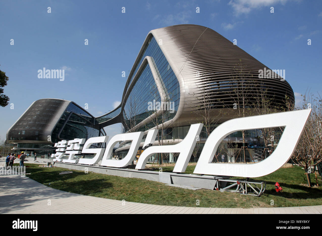 Satoshi Zhang Xin Soho China