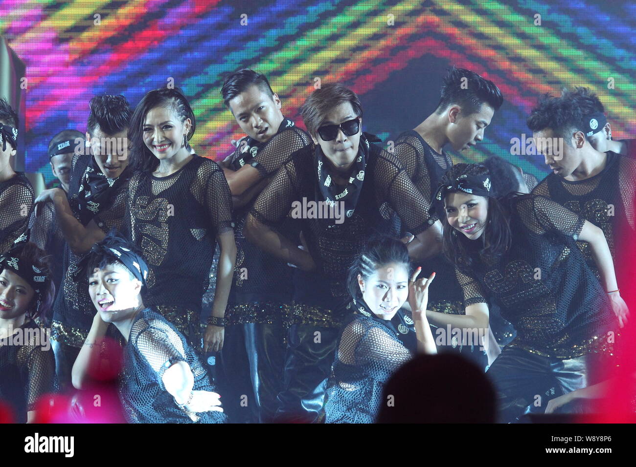 Taiwanese singer Show Lo, center, performs at the concert of his "Show ...