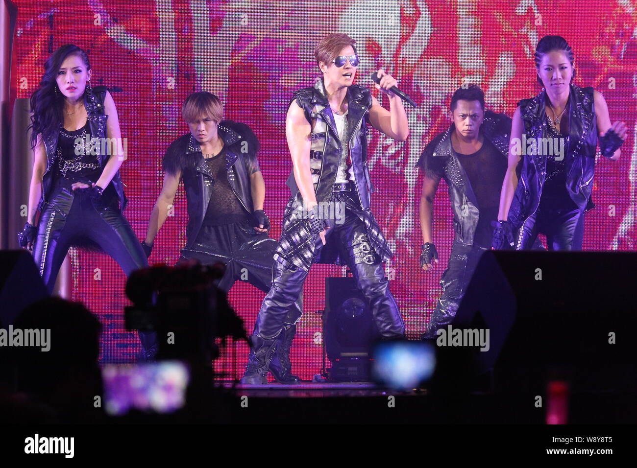 Taiwanese singer Show Lo, center, performs at the concert of his "Show ...