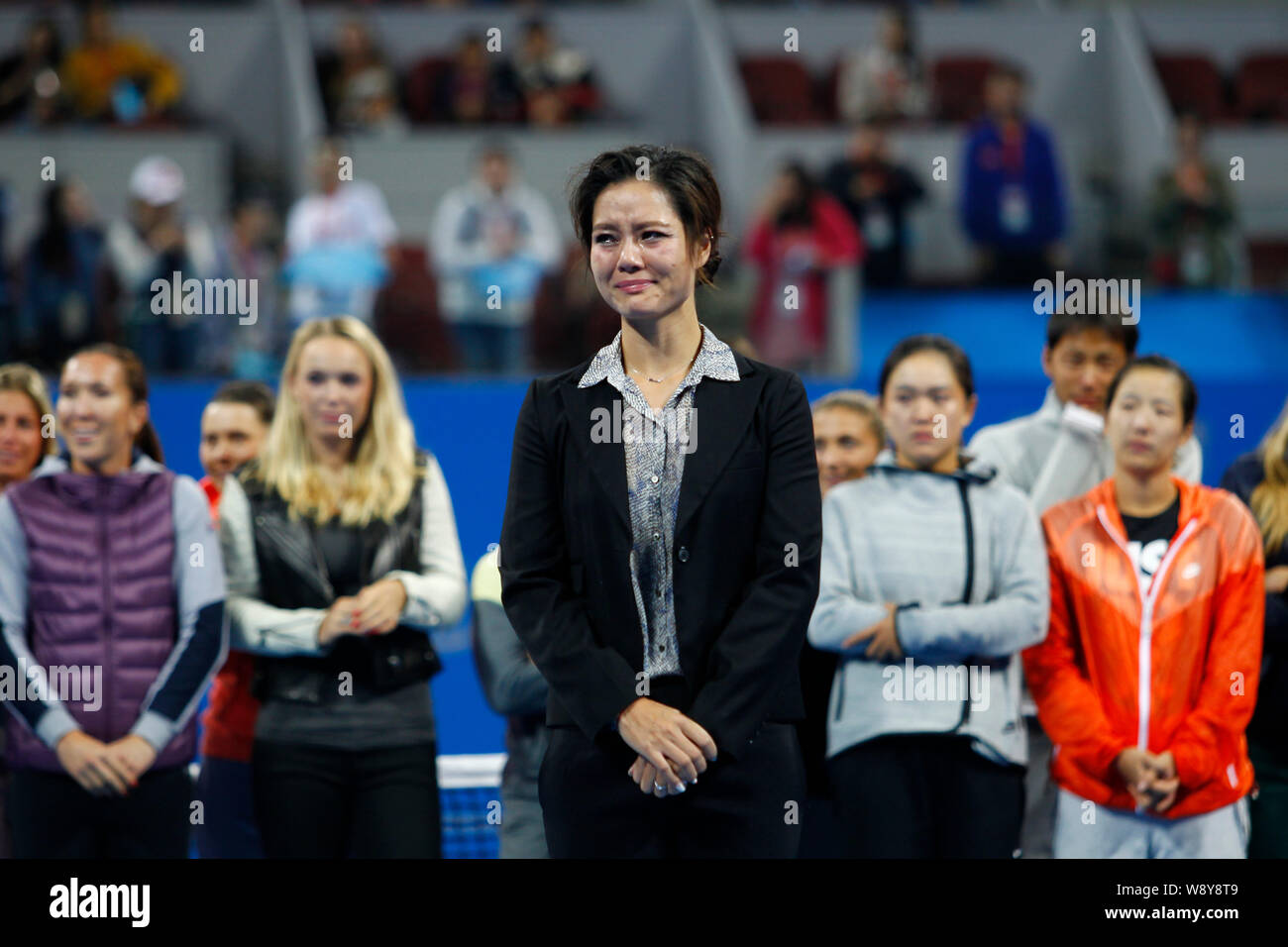 Chinese tennis player Li Na cries during her retirement ceremony at the ...
