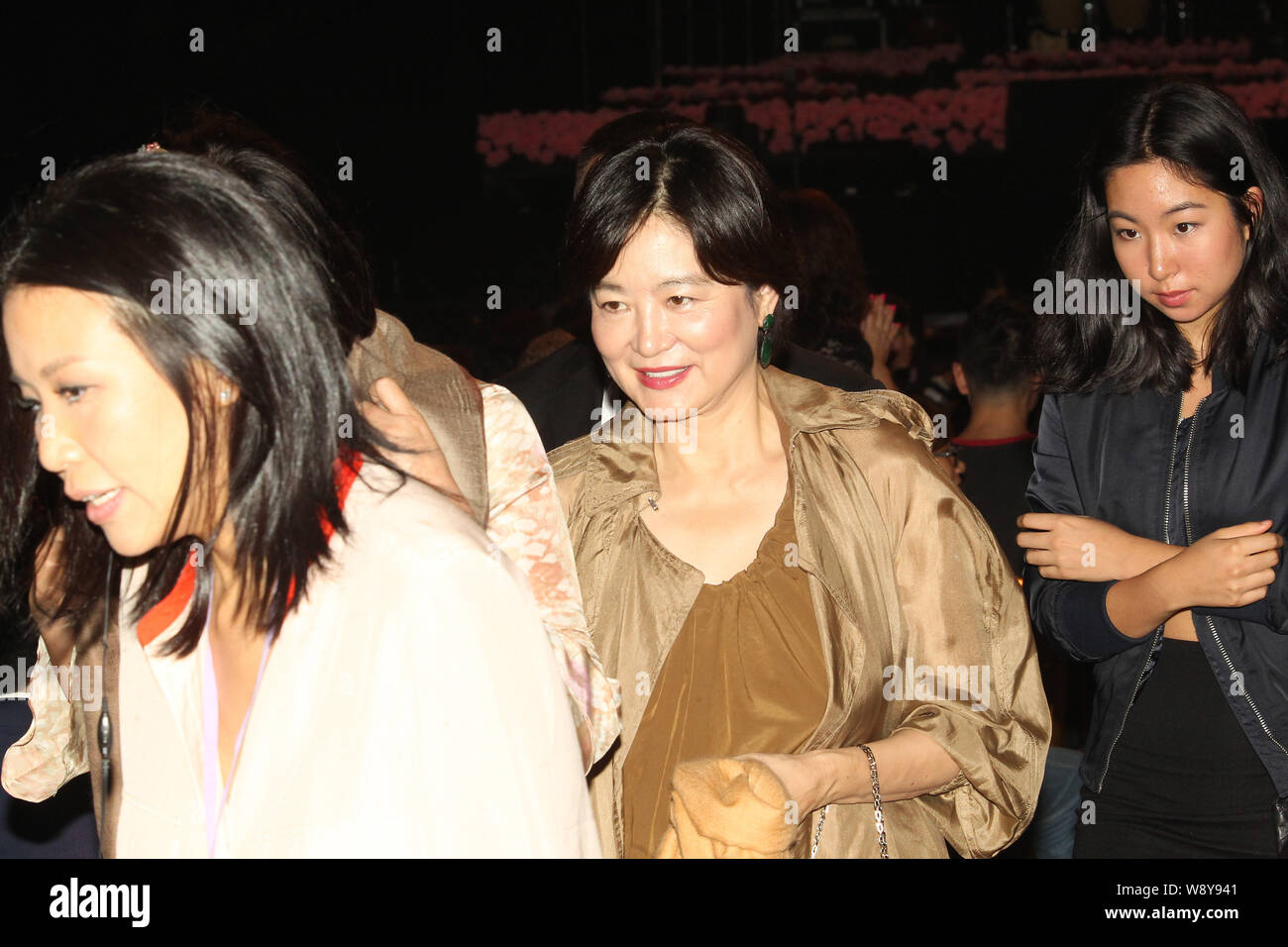 Taiwanese actress Brigitte Lin, center, arrives at the Project WAO x ...