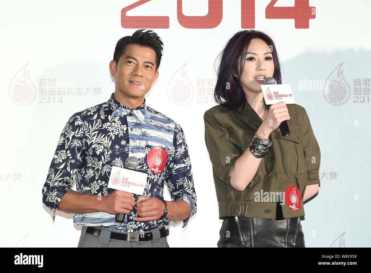 Hong Kong singer and actress Miriam Yeung Chin-wah, right, speaks next to singer and actor Aaron ...