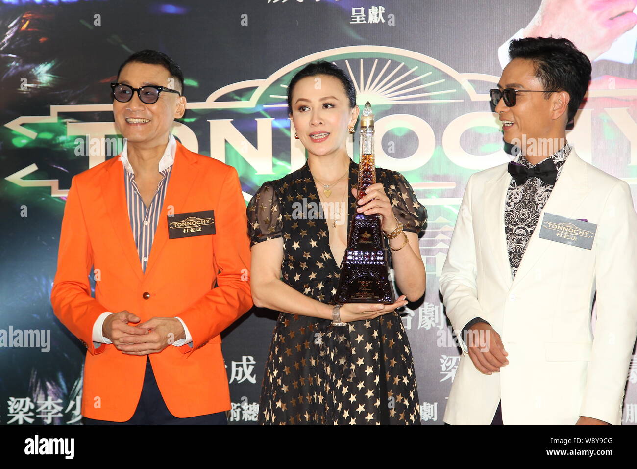 (From left) Hong Kong actor Tony Leung Ka-fai, actress Carina Lau and ...
