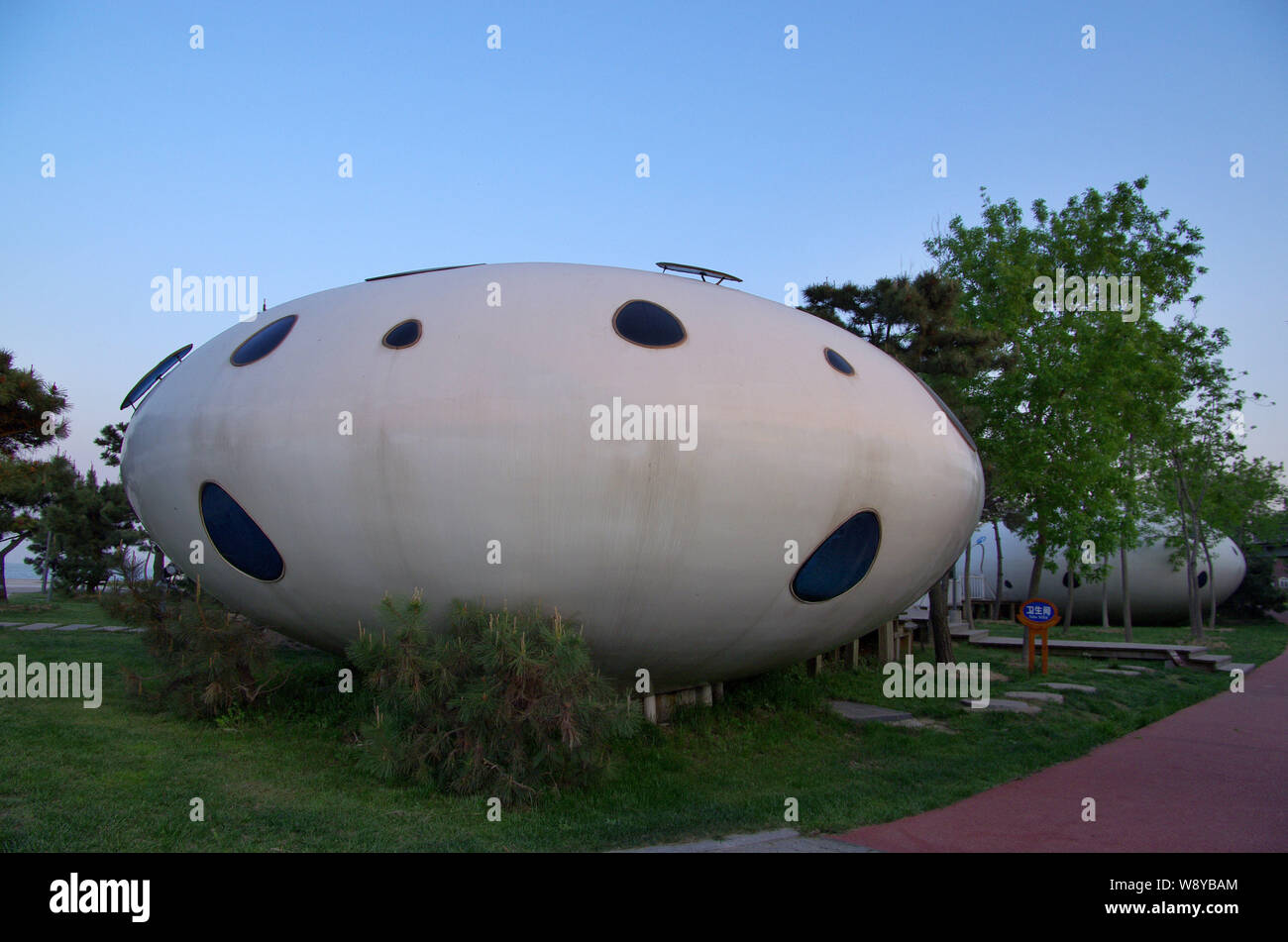 A UFO-shaped building is pictured at a scenic spot near a beach in ...