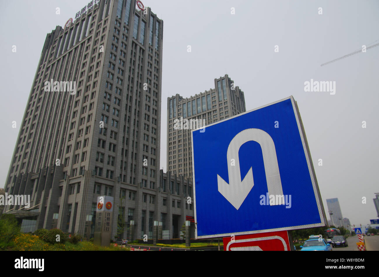 --FILE--A turn-around sign is pictured next to a high-rise building in Rizhao city, east Chinas ...