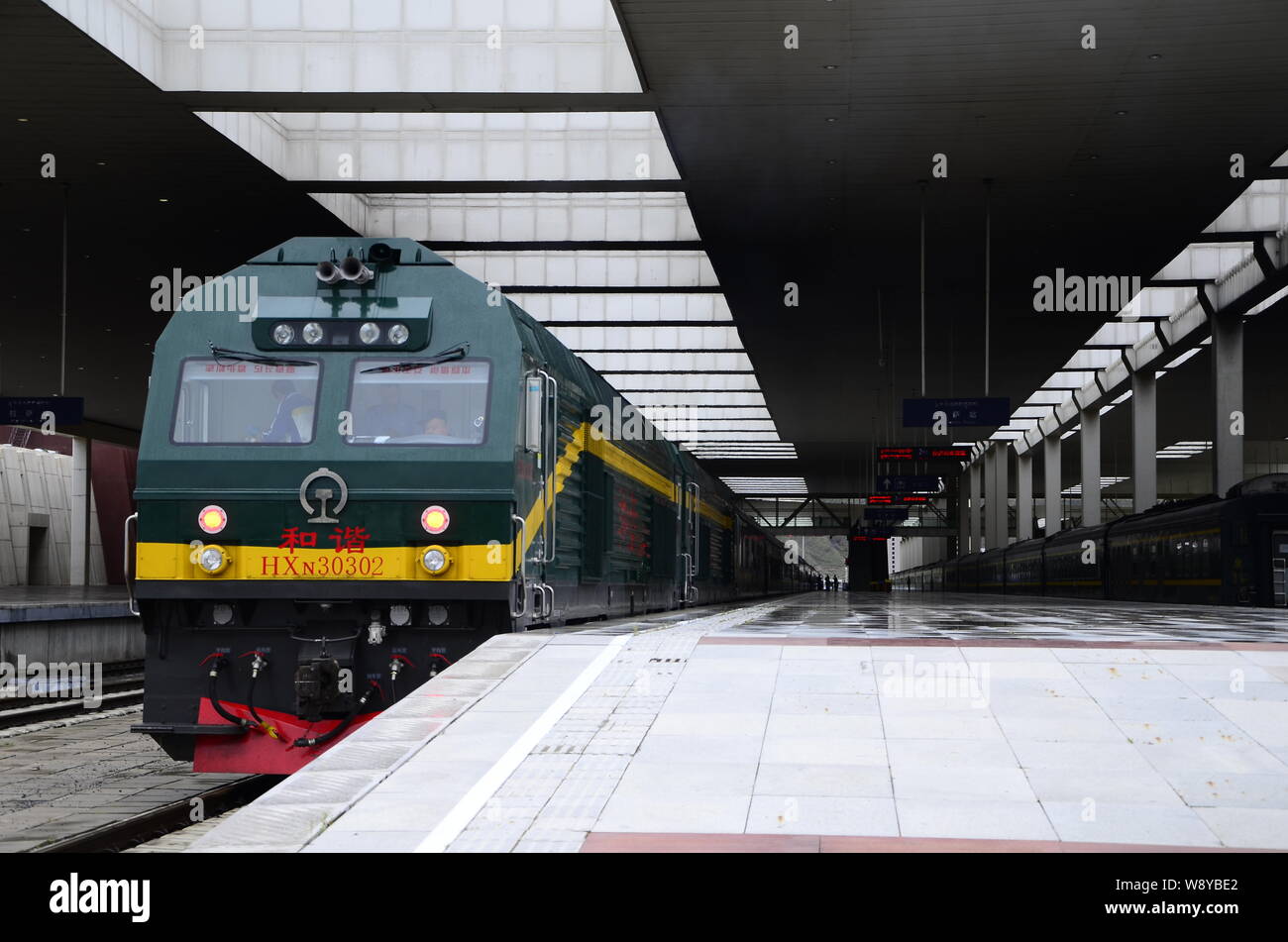 A passenger train is seen at the Lhasa Railway Station in Lhasa city ...