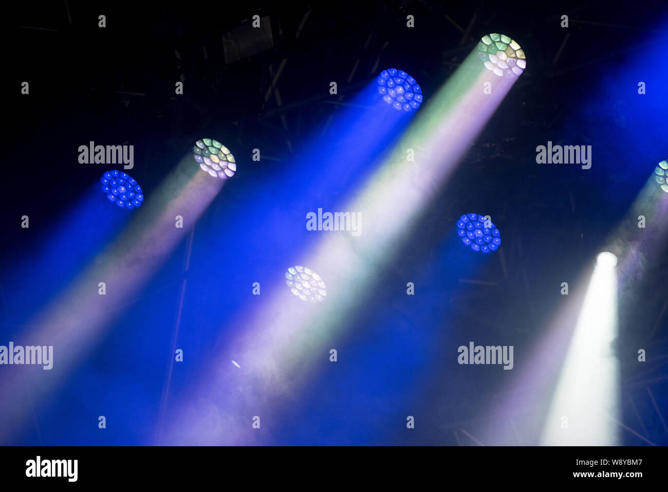 Blue stage lights at music festival Stock Photo - Alamy