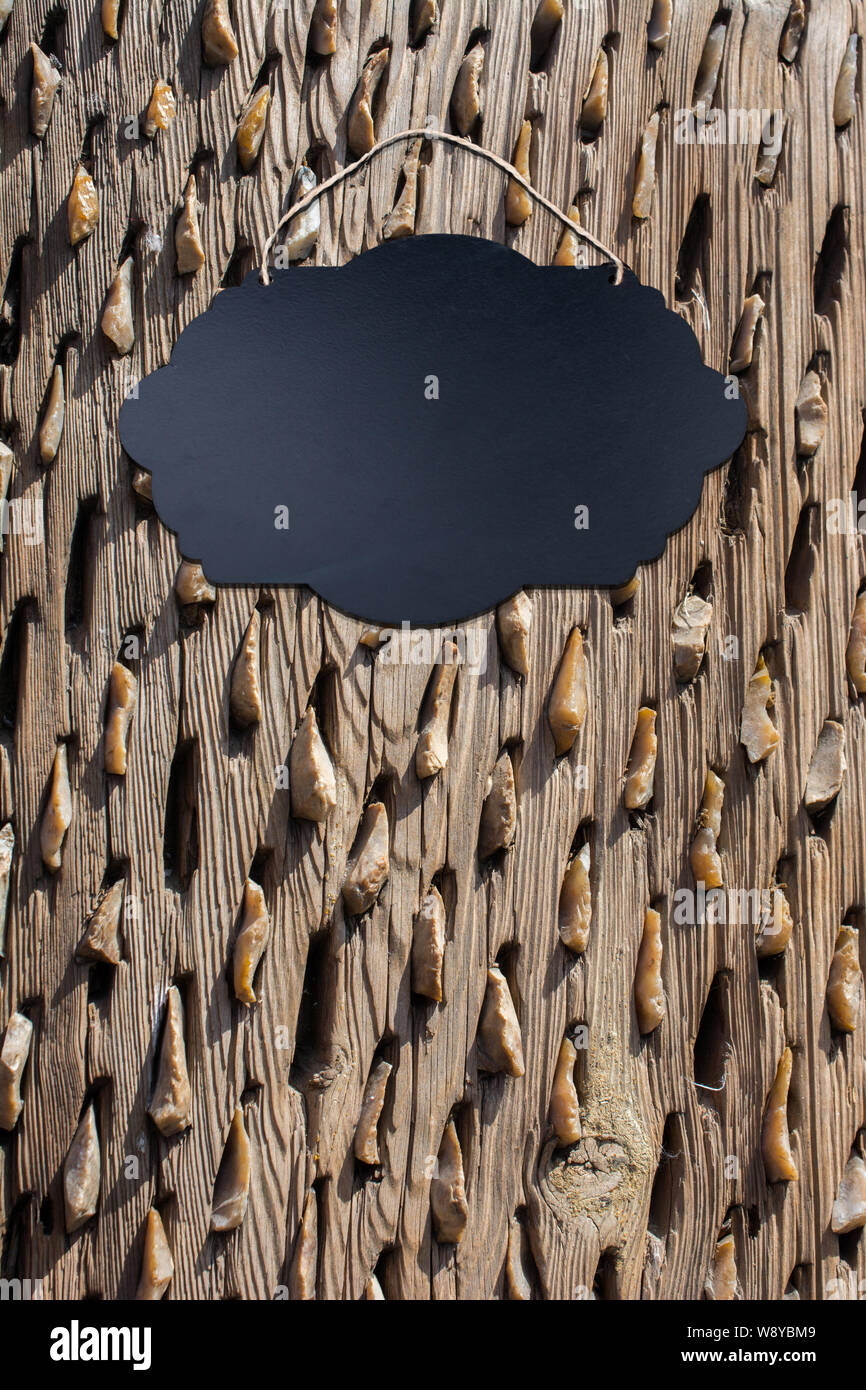 Black Empty Sign Board with string for hanging on wall Stock Photo - Alamy