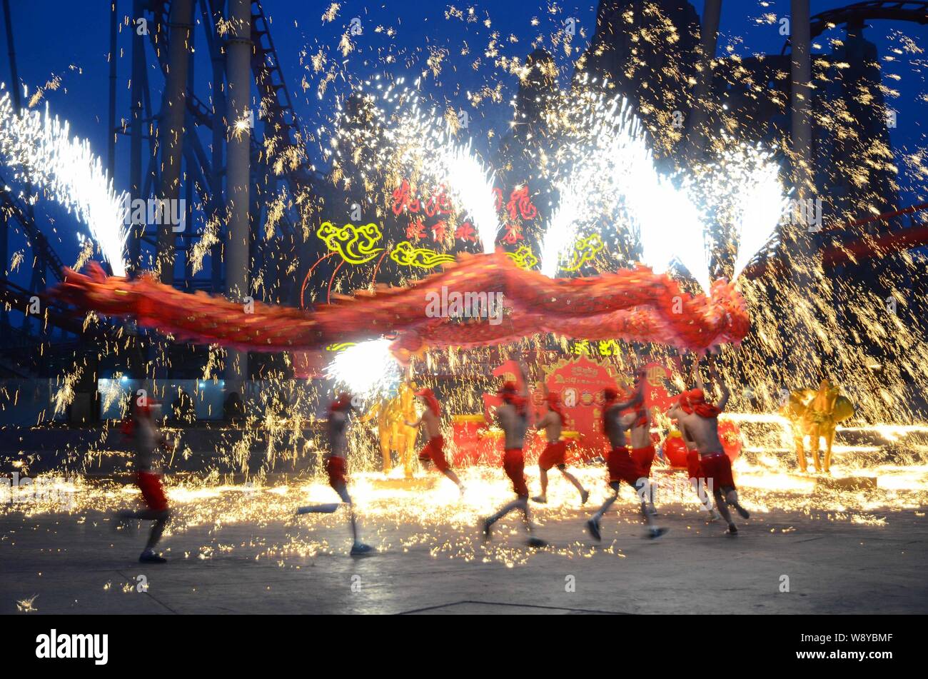Actors perform fire dragon dance at Happy Valley in Beijing, China, 5 ...