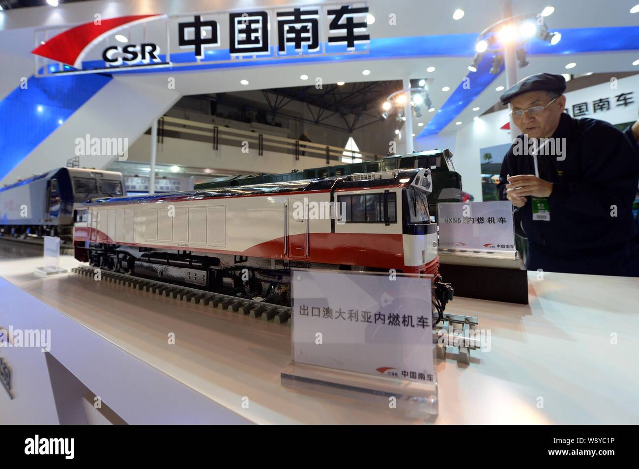 --FILE--A visitor looks at a model of a train to be exported to ...