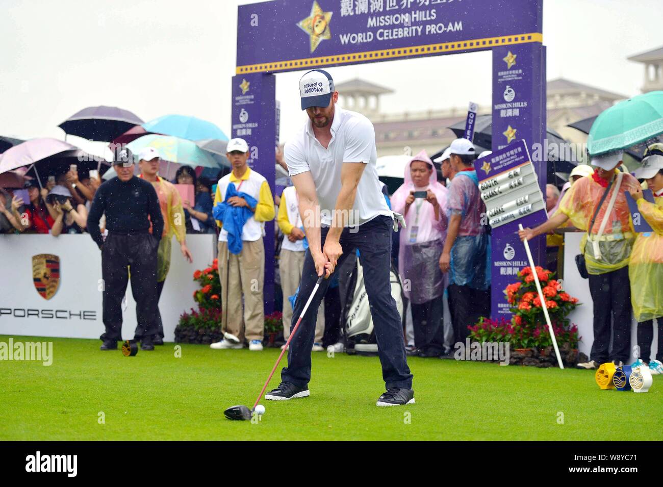 American actor Chris Evans prepares to tee off during the 2014 Mission ...