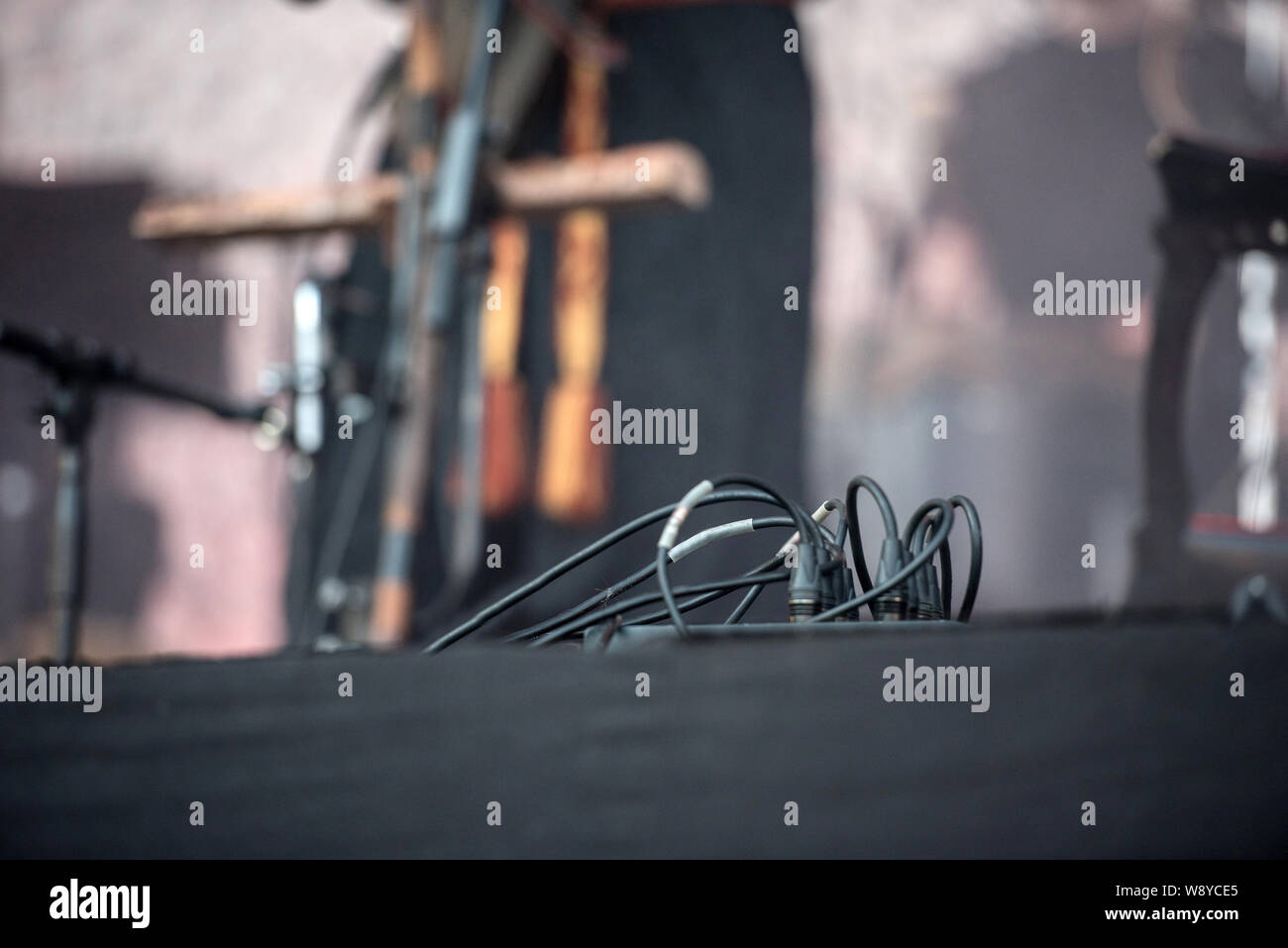 Audio cables on the stage at music concert Stock Photo - Alamy