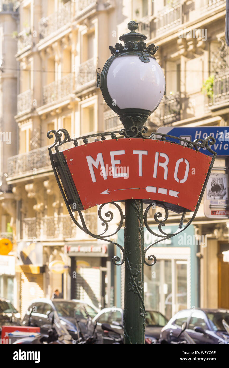 Paris metro sign - metro signpost in Montmartre area of Paris, France ...