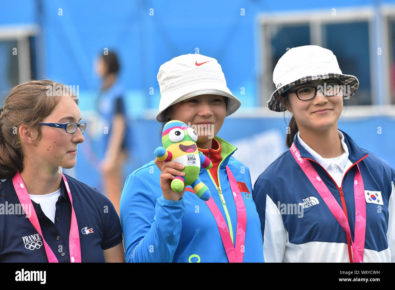 (From left) Silver medalist Melanie Gaubil of France, gold medalist Li ...