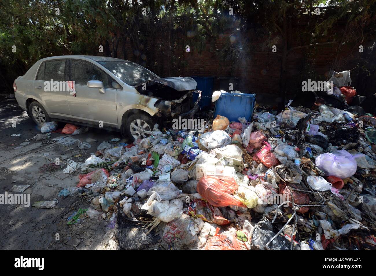 --FILE--Garbage piles are seen at a real estate project in Beijing ...