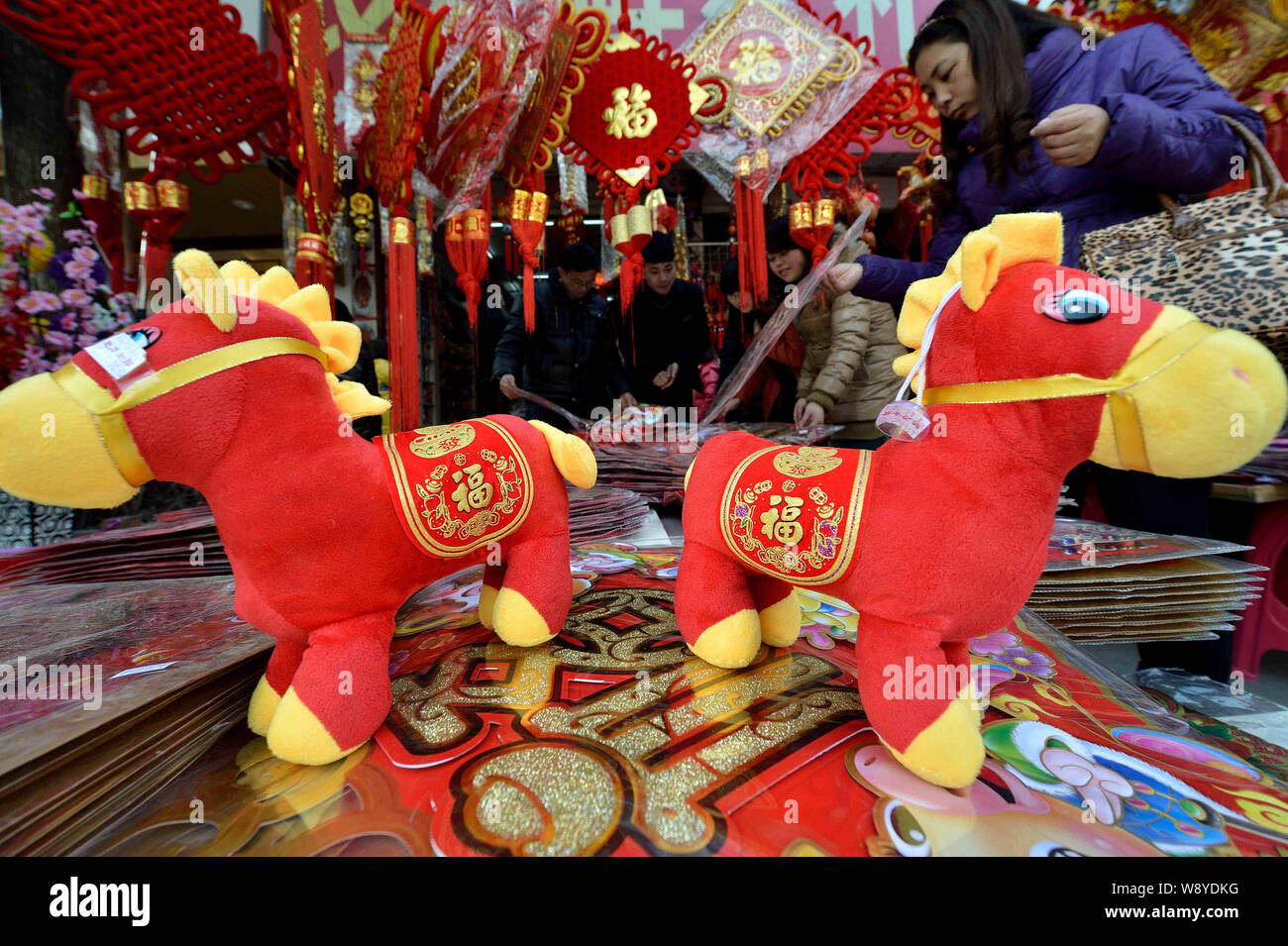 Chinese customers shop for red decals and decorative knots for upcoming ...