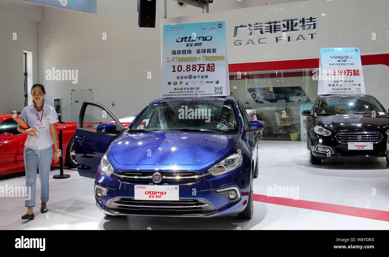--FILE--Visitors try out a Fiat Ottimo of GAC Fiat Chrysler, a joint ...