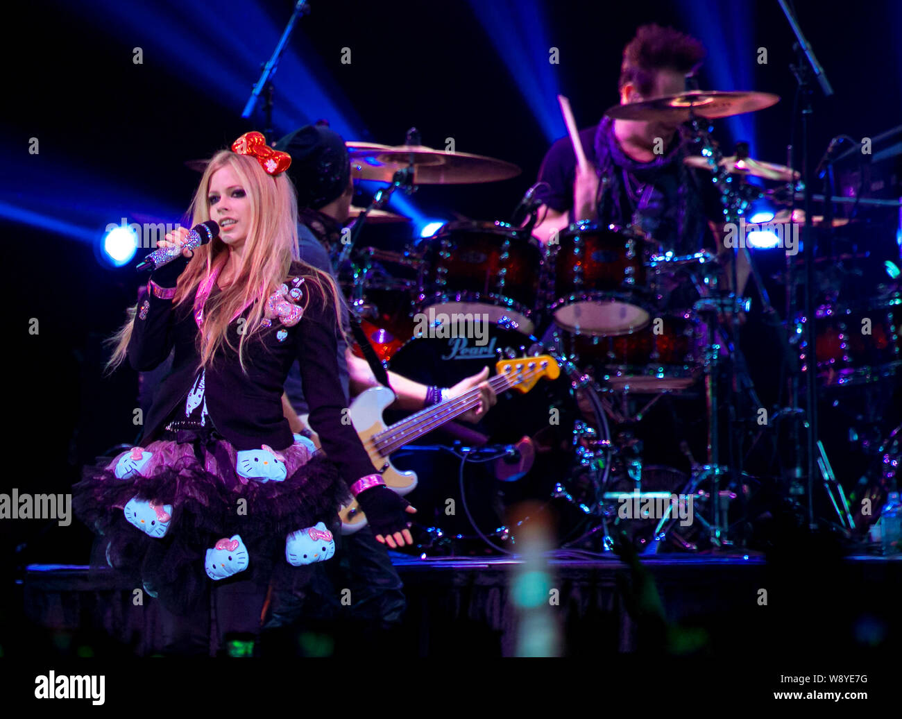 Canadian singer Avril Lavigne, left, performs during her World Tour ...