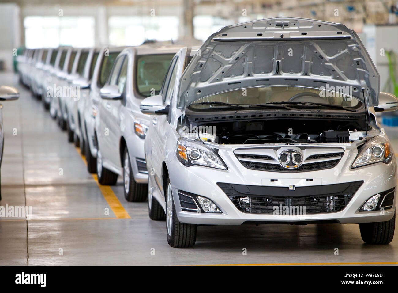 --FILE--New E150 electric vehicles are displayed at an auto plant of BAIC Group in Beijing ...