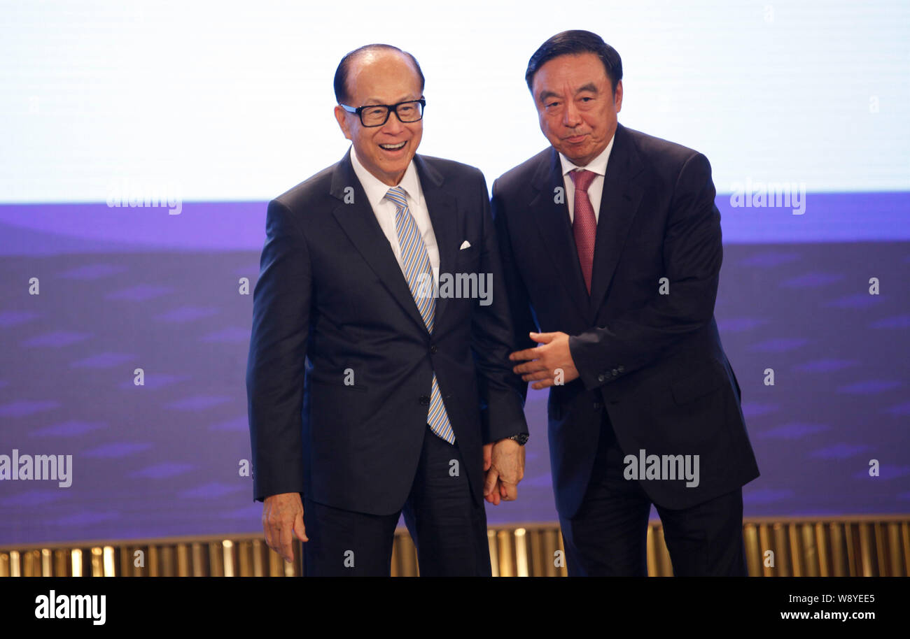 Li Ka-shing, left, Chairman of Cheung Kong (Holdings) Limited and Chairman of Hutchison Whampoa ...