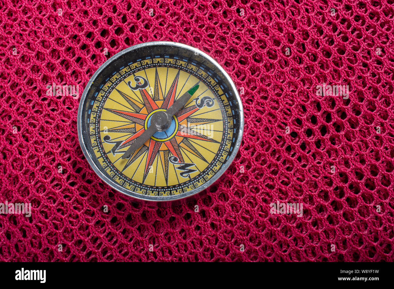 Magnetic compass tool as a concept of traveling Stock Photo - Alamy