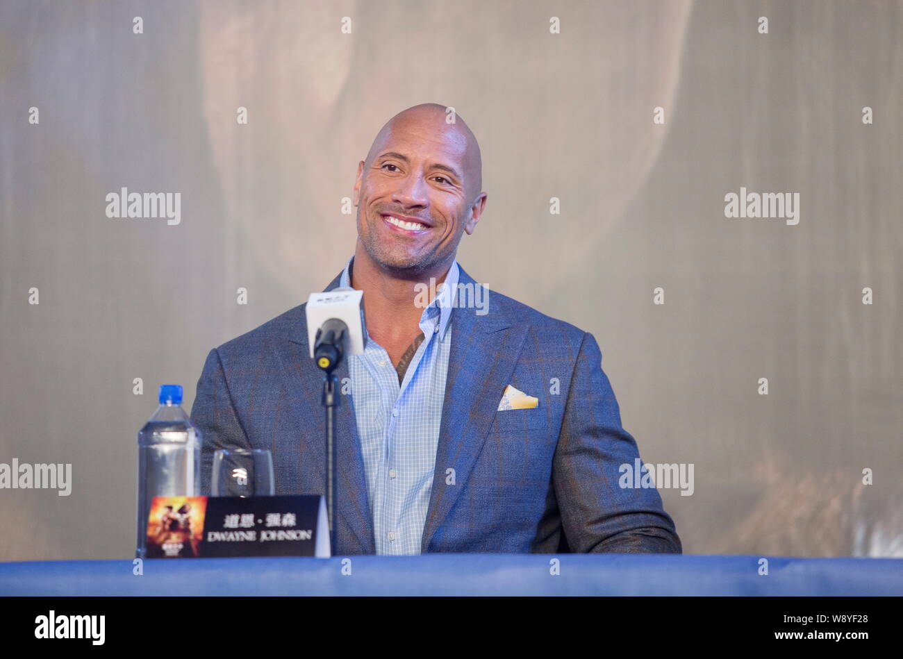 American actor Dwayne Johnson smiles during a press conference for his ...