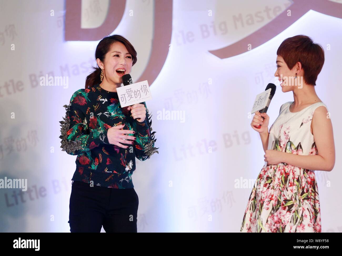 Hong Kong actress Miriam Yeung, left, speaks during a press conference ...