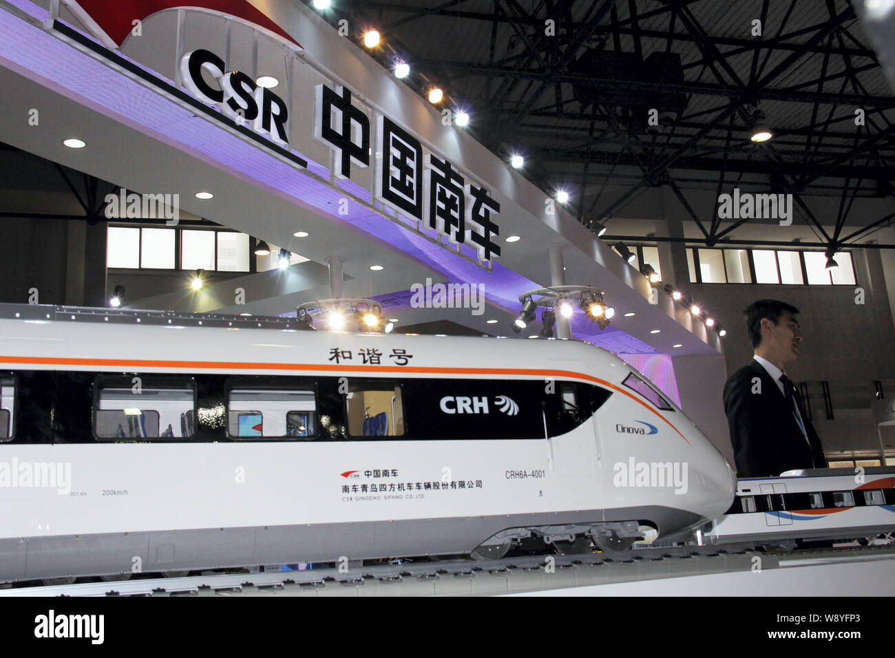 --FILE--Models of high-speed bullet trains are displayed at the stand ...