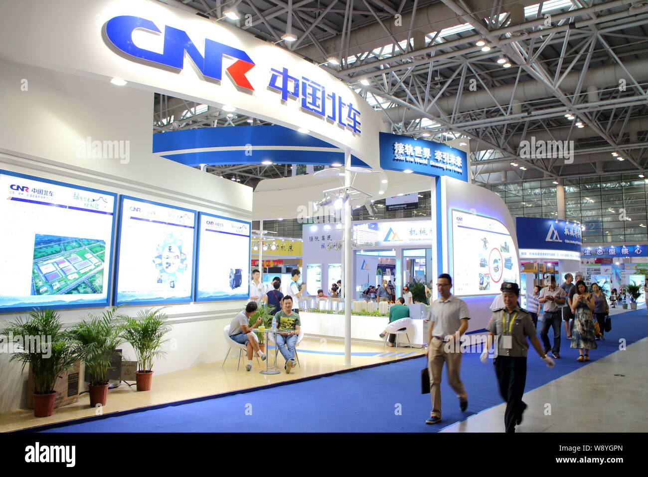 --FILE--Visitors walk past the stand of CNR (China Northern Locomotive ...