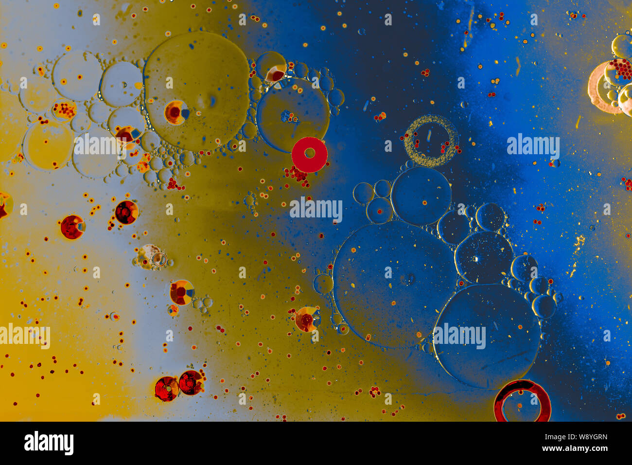 Oil bubbles inside water base form patterns Stock Photo - Alamy