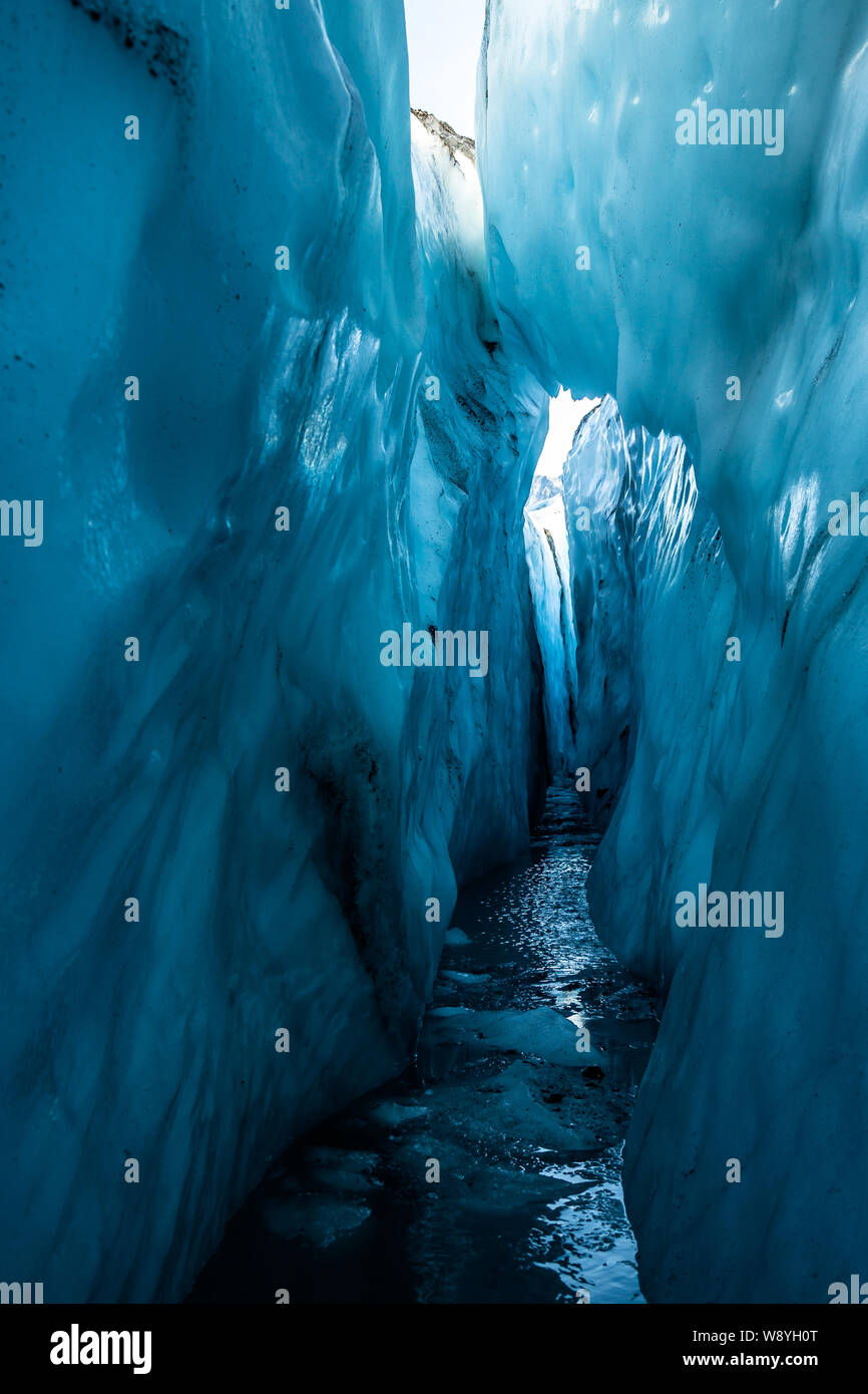 An ice bridge spanning a large crevasse viewed from below, inside the ...