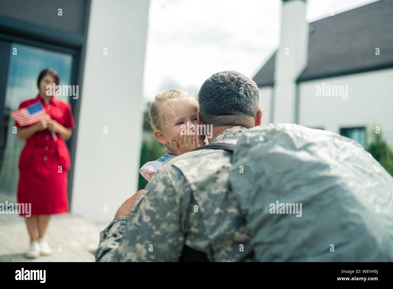 People Crying At A Military Funeral