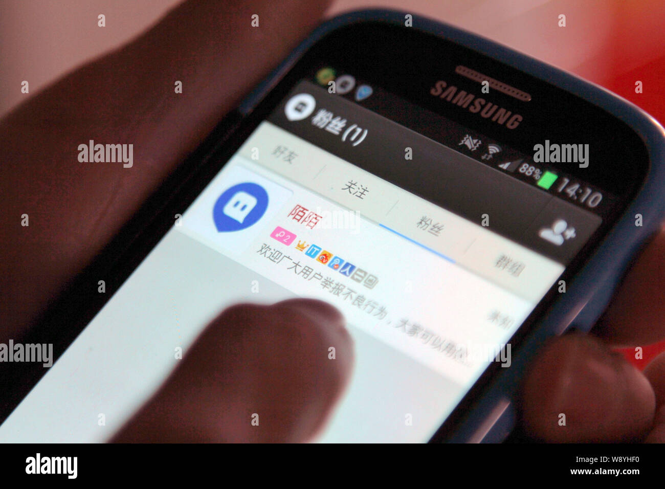 --FILE--A Chinese mobile phone user uses the mobile social networking ...