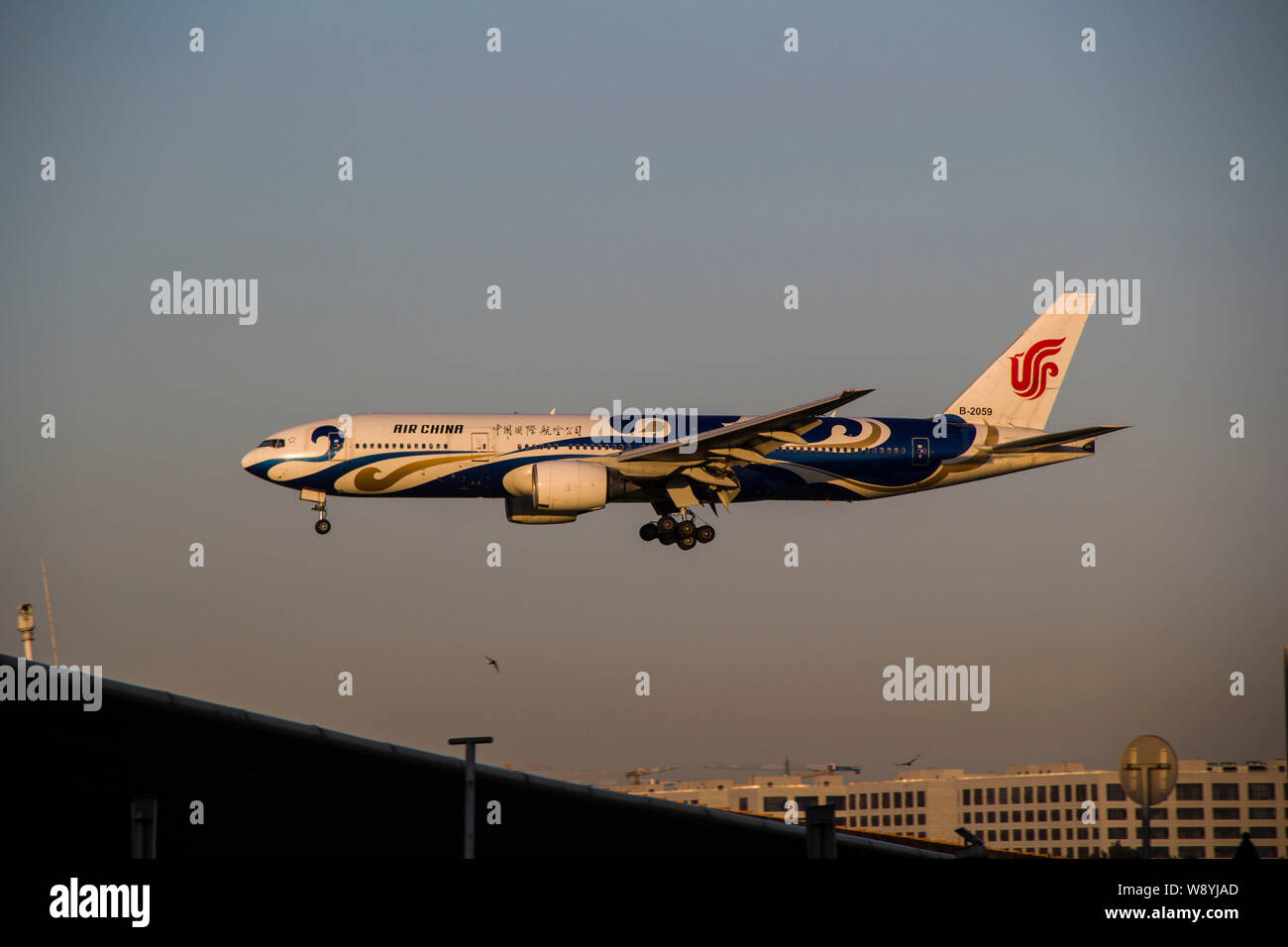 --FILE--A plane of Air China is to land at the Beijing Capital ...